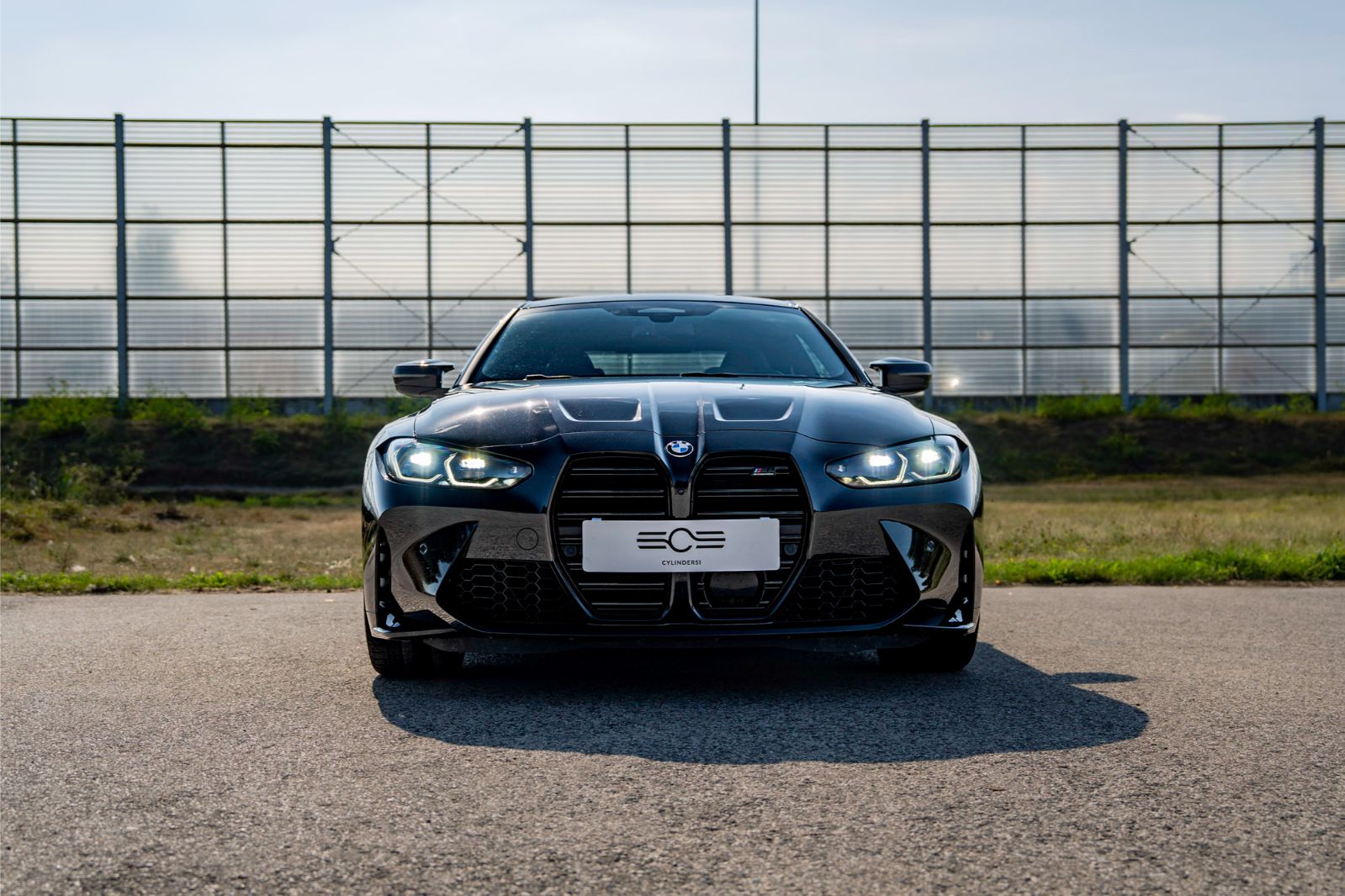 BMW M4 Competition M xDrive Coupe Black% Rental | Cylinders Rental.